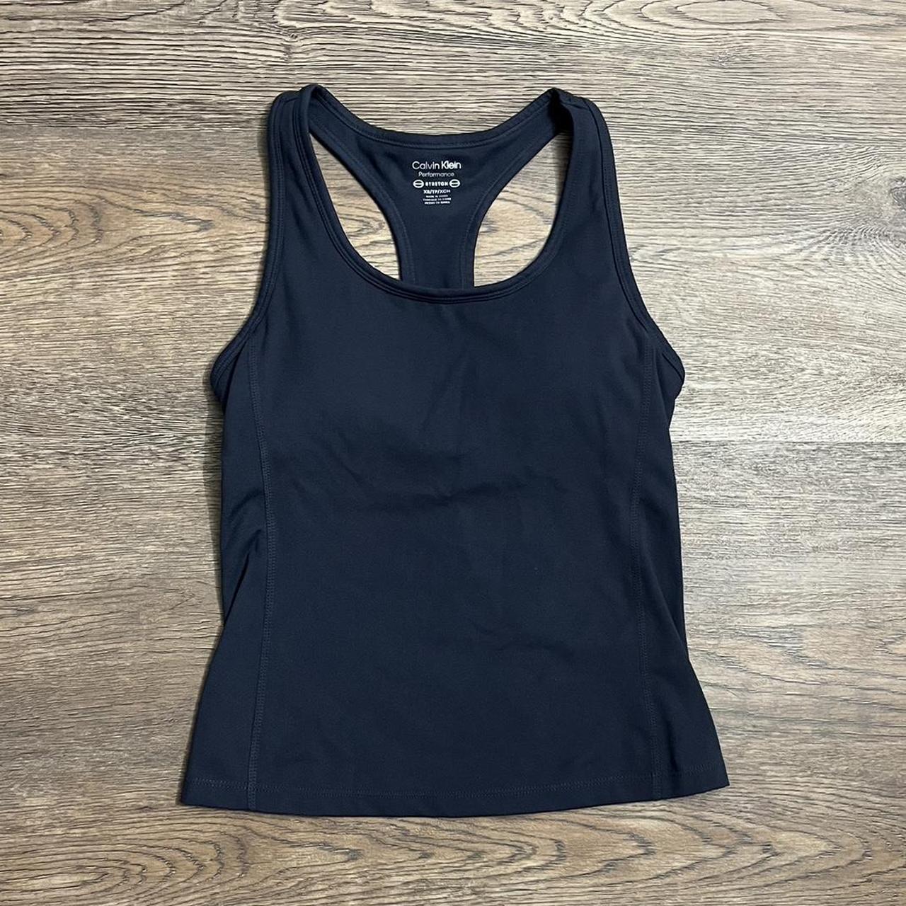 XS Calvin Klein padded navy blue racerback tank top;... - Depop