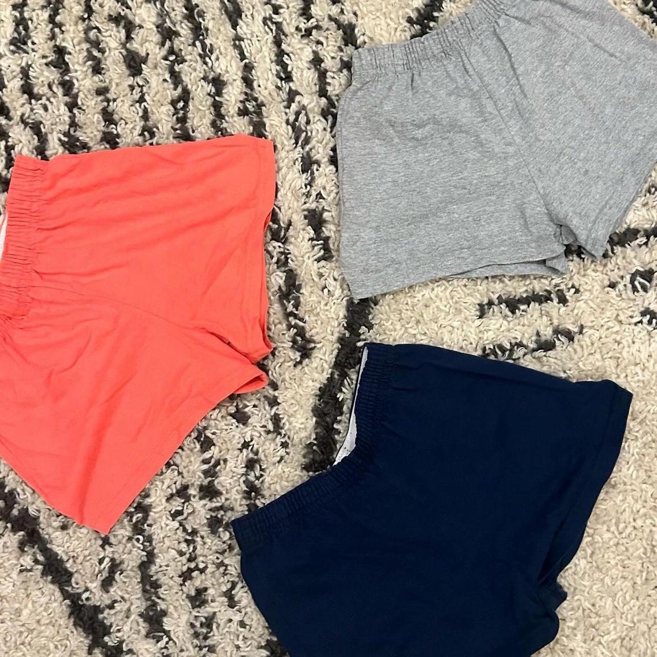 3 pairs of shorts, one pink, one grey, and one navy... - Depop