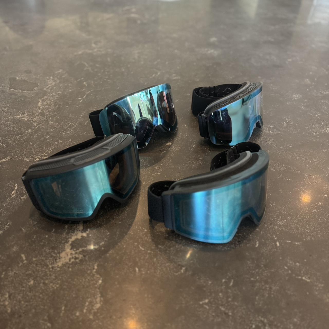 Black and blue ski goggles with adjustable straps... | Depop