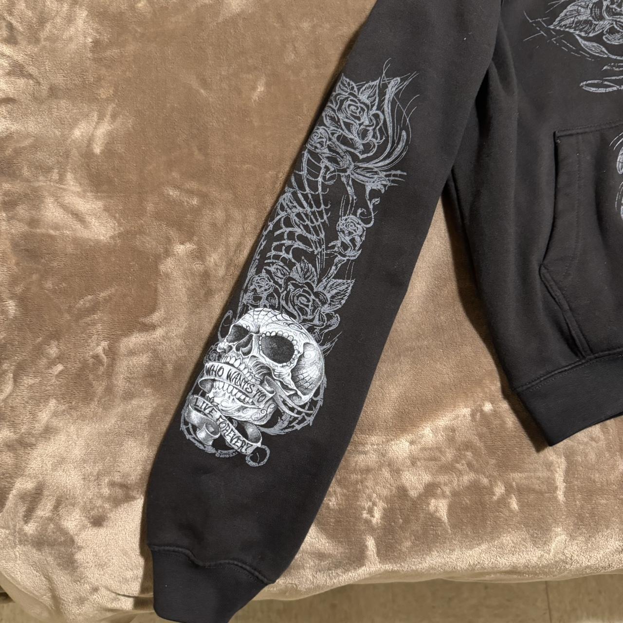 Affliction like skull hoodie size large and has a... - Depop