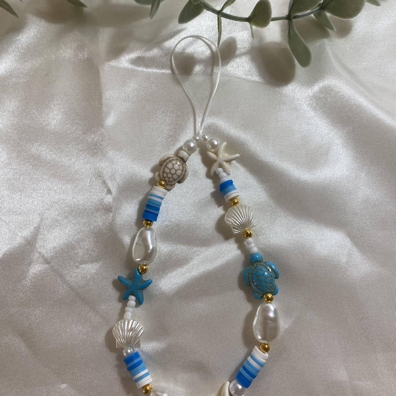 gorgeous blue phone charm super cute and easy to put... - Depop