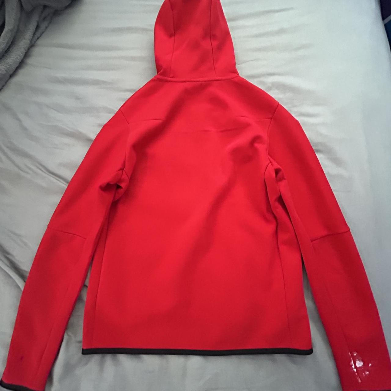 Men’s red nike tech, size medium. Has one decent... - Depop