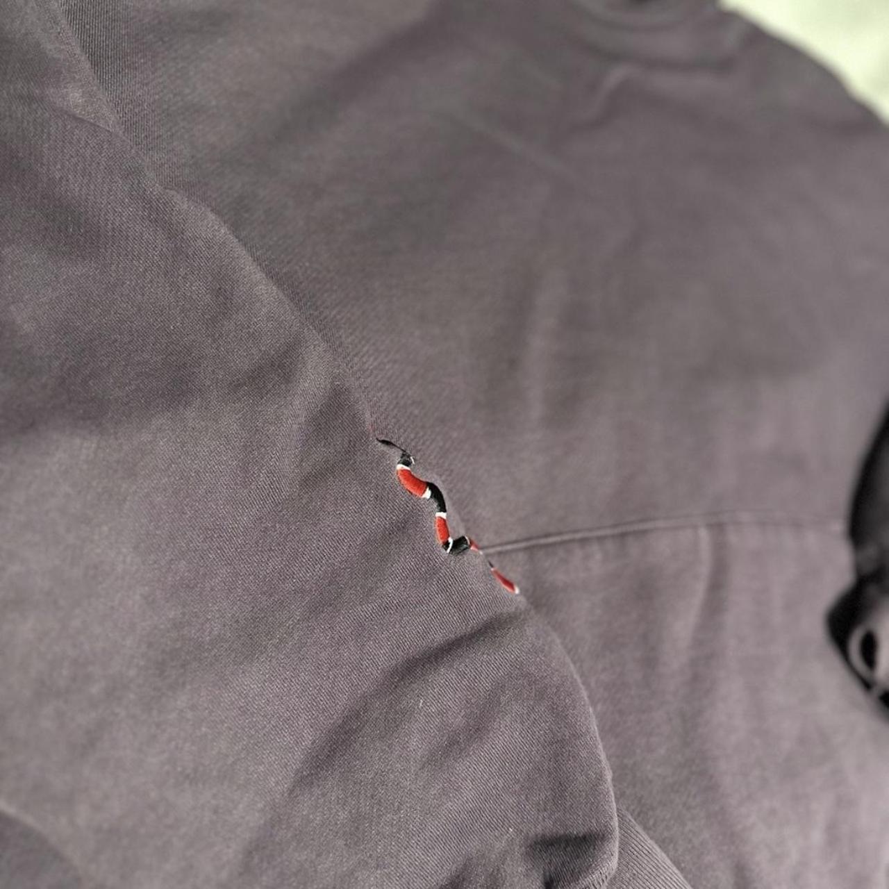 Washed out purple sweatshirt with snake details in... - Depop