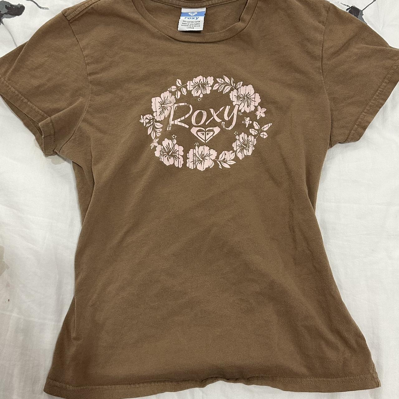 Cute Roxy with Pink Floral Design It is tight... - Depop