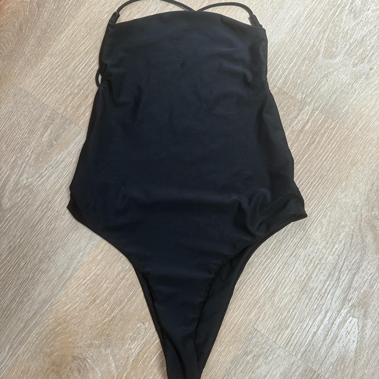 Black One Piece I forgot the brand Worn only once - Depop