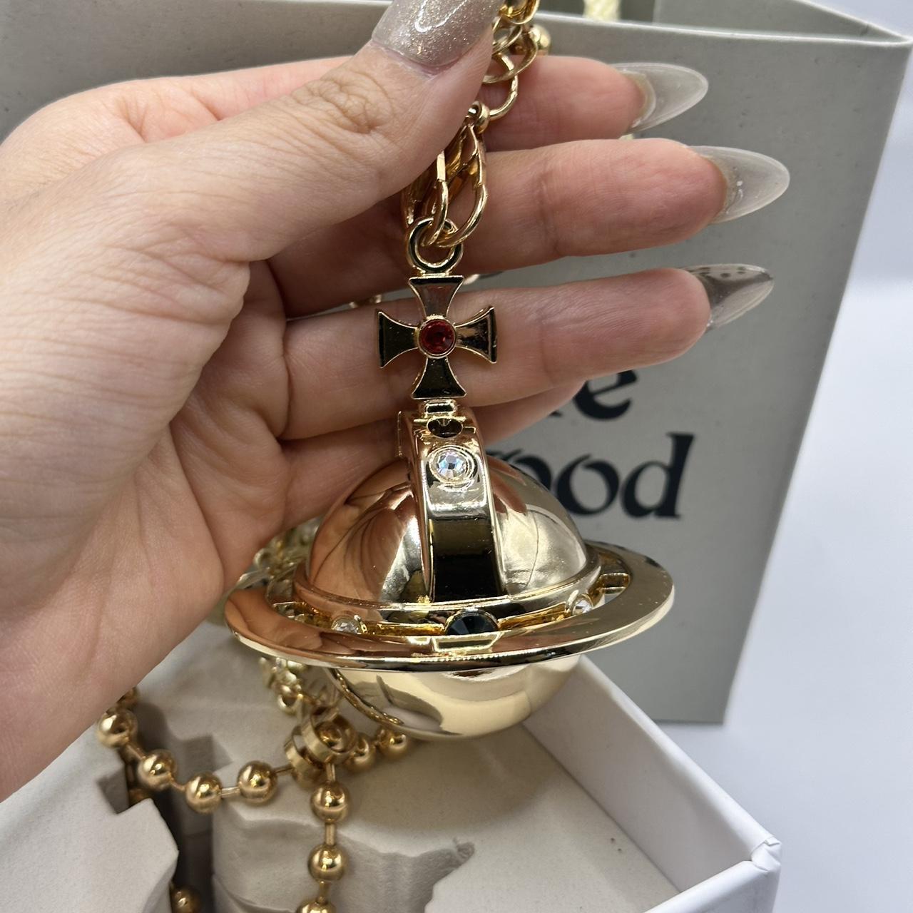 Vivienne westwood lighter orb New with box!!! No... | Depop