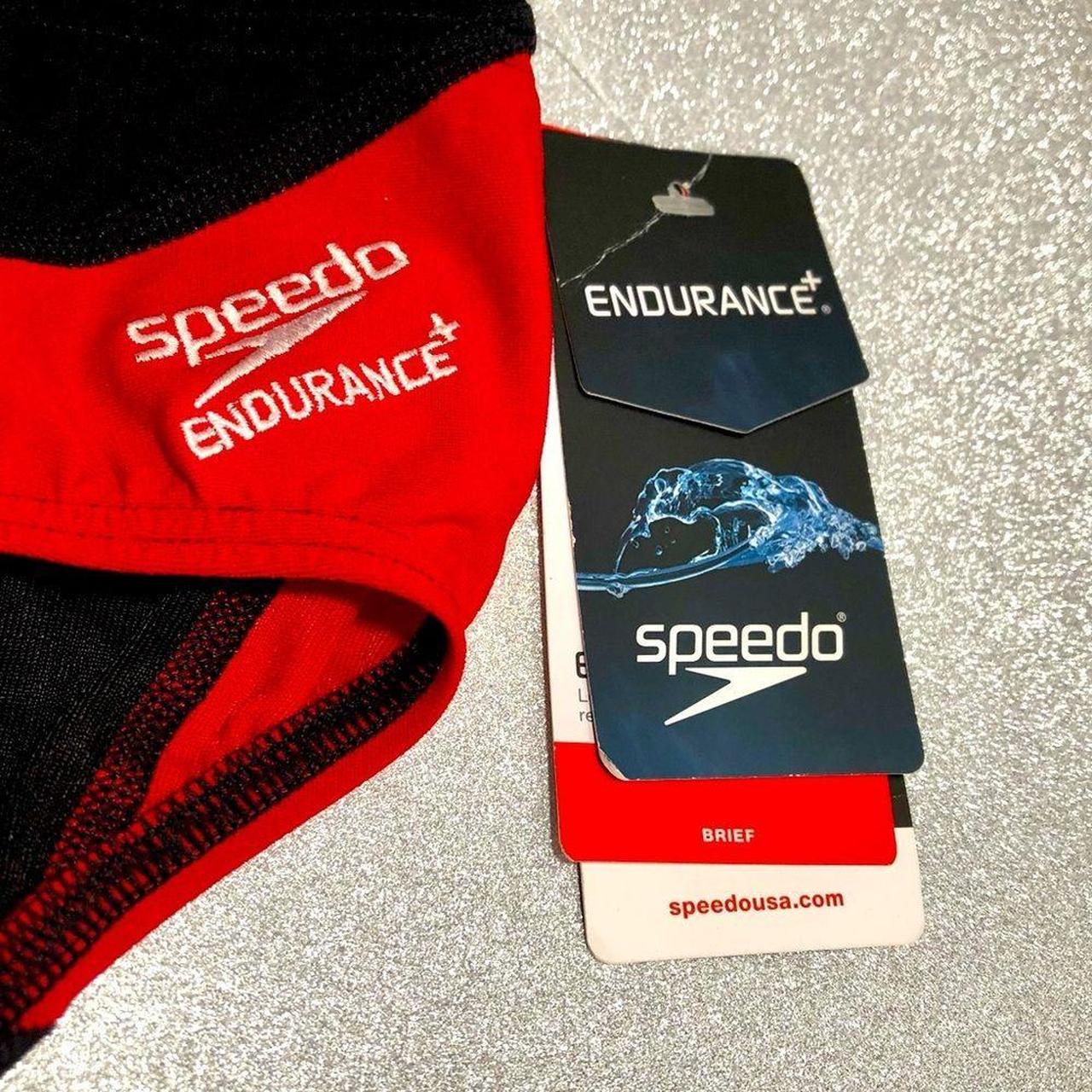NWT SPEEDO ENDURANCE + BLACK AND RED SIZE 28 #Summer... - Depop