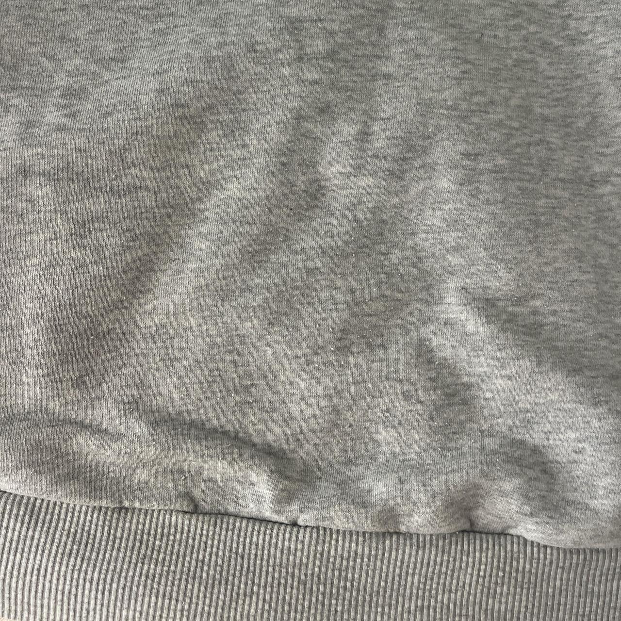 grey zip up from american eagle with slight pilling... | Depop