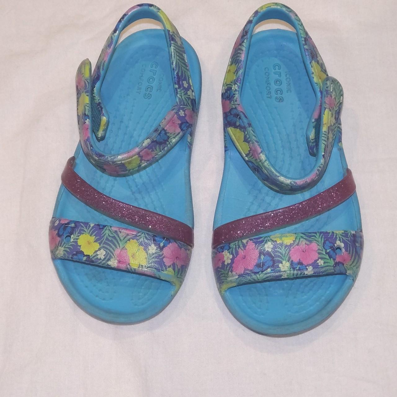 Crocs Children's blue crocs sandals, with a flower... - Depop