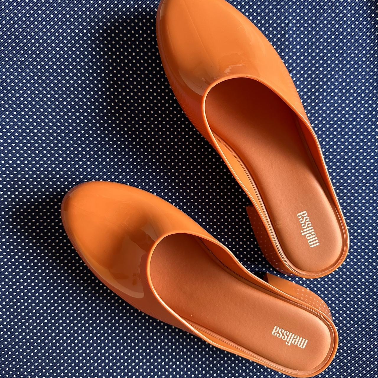 Bright orange Melissa brand slip on shoes in great... - Depop