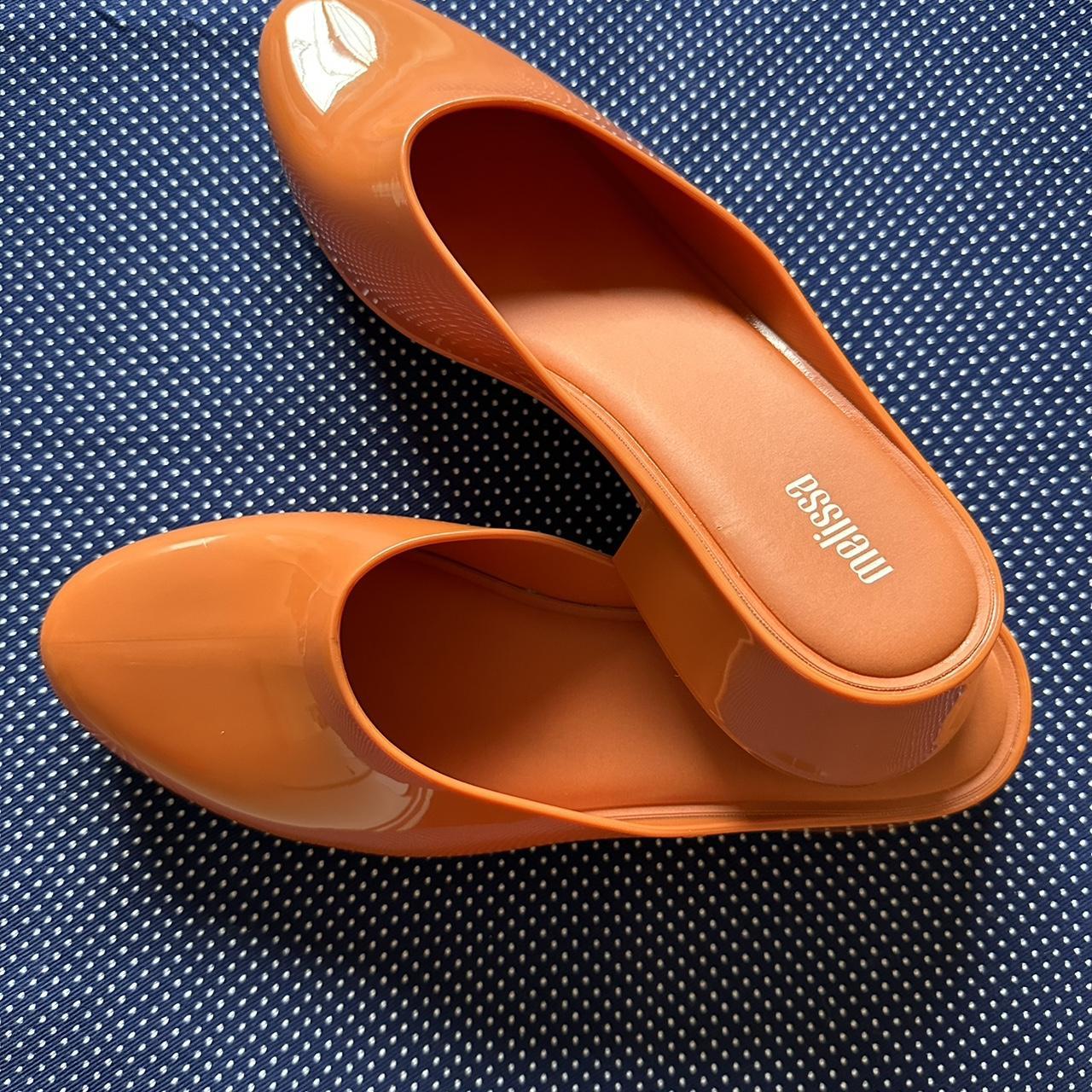 Bright orange Melissa brand slip on shoes in great... - Depop