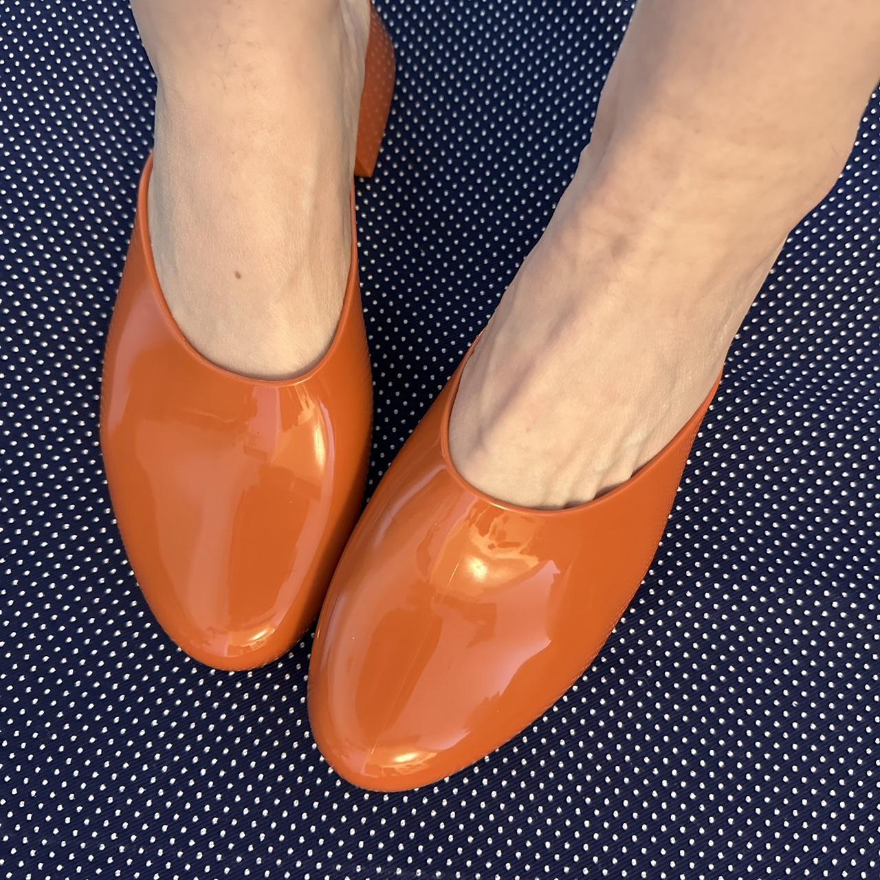 Bright orange Melissa brand slip on shoes in great... - Depop
