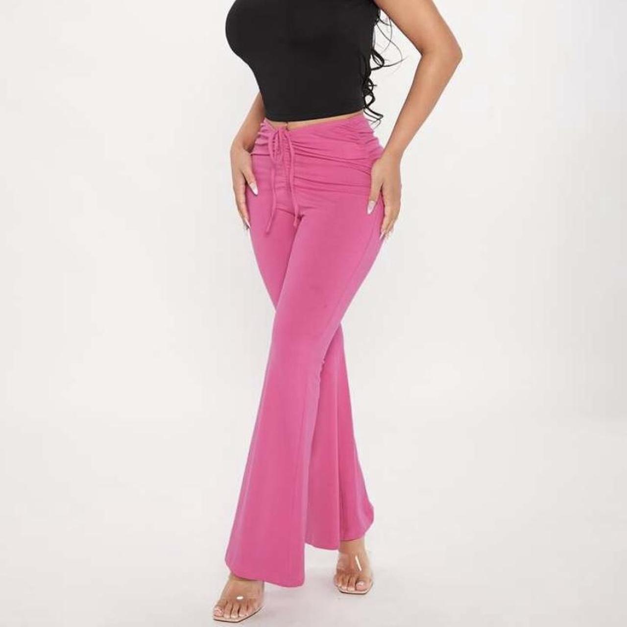 Pink flared pants with drawstrings Do have some... - Depop