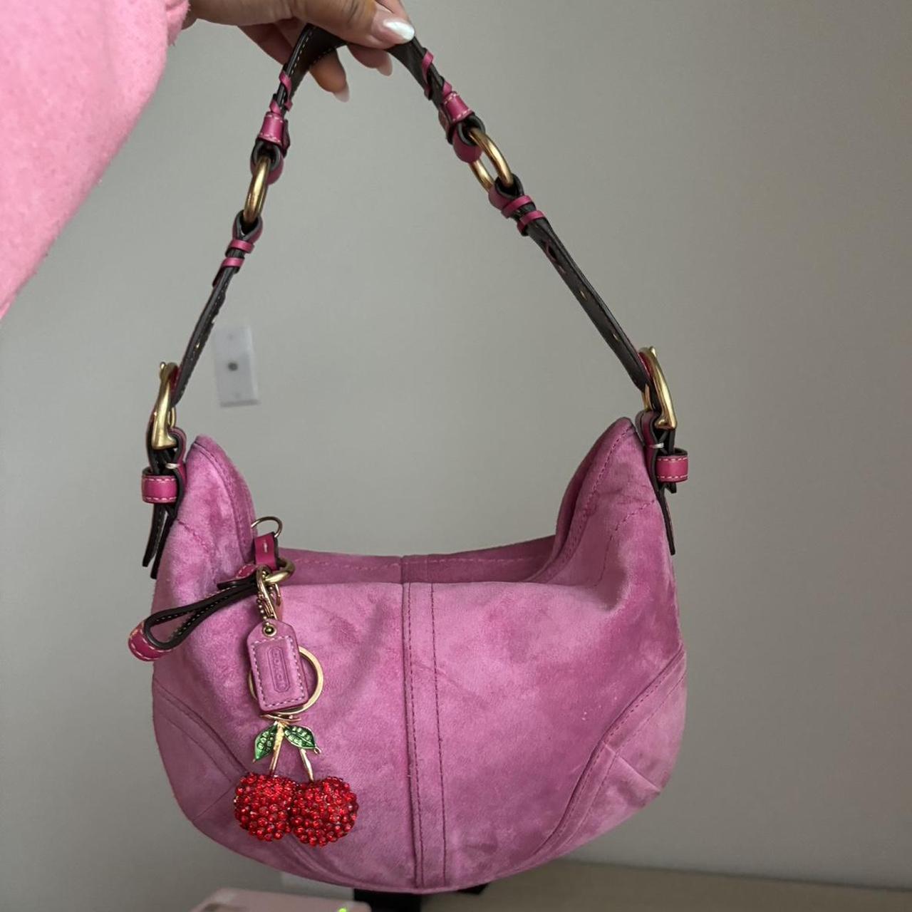 Coach Soho Pink super cute price firm charm is not... - Depop