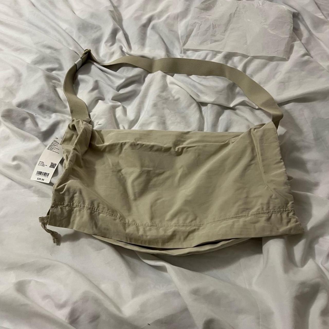 Uniqlo drawstring bag in white / cream. New with... | Depop