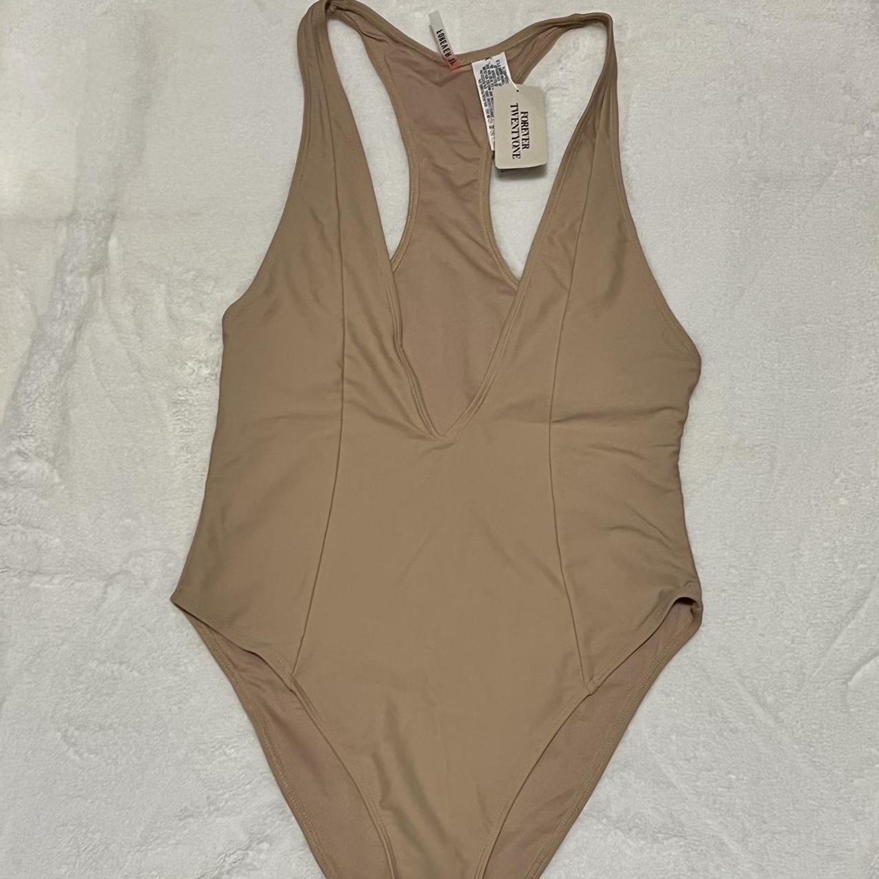 Low plunge front Raver back High cut fit New... - Depop