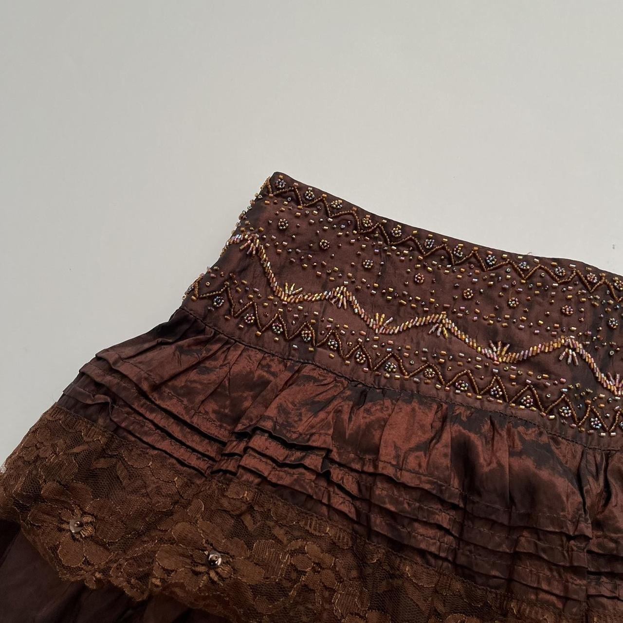 Brown ruffle skirt with lace and beading details... - Depop