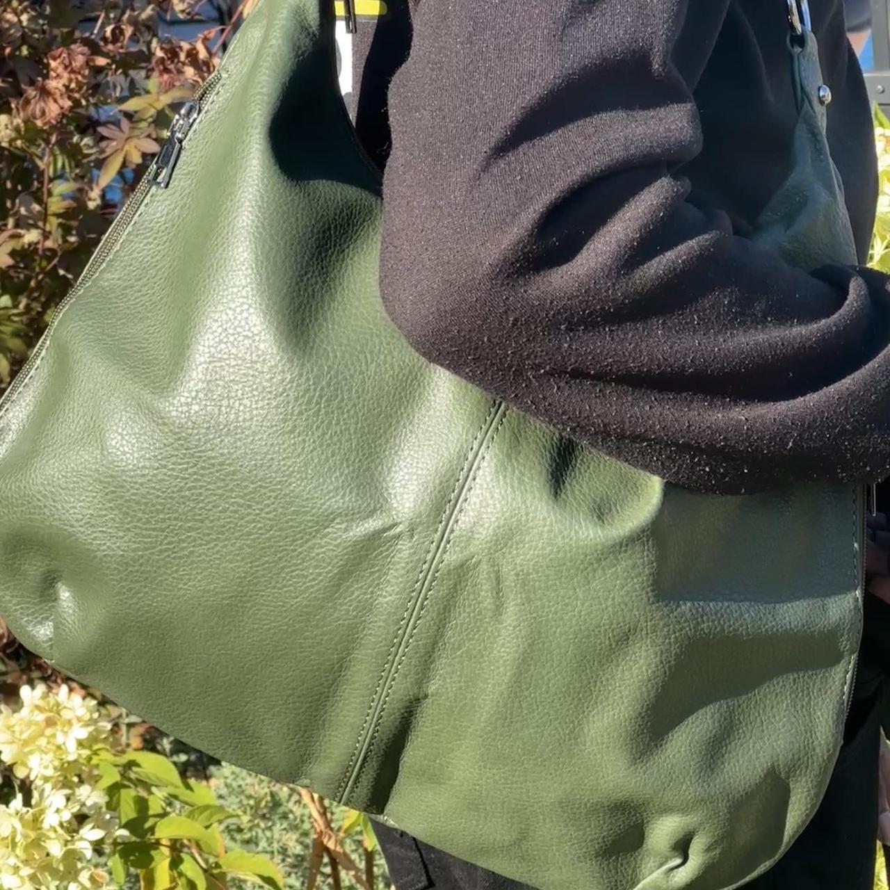 Green leather hobo bag with a zipper closure,... | Depop