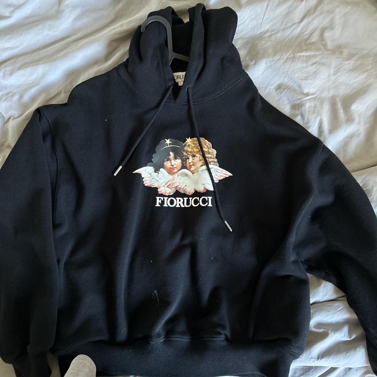 Black fiorucci hoodie. Nice baggy fit and thick... - Depop