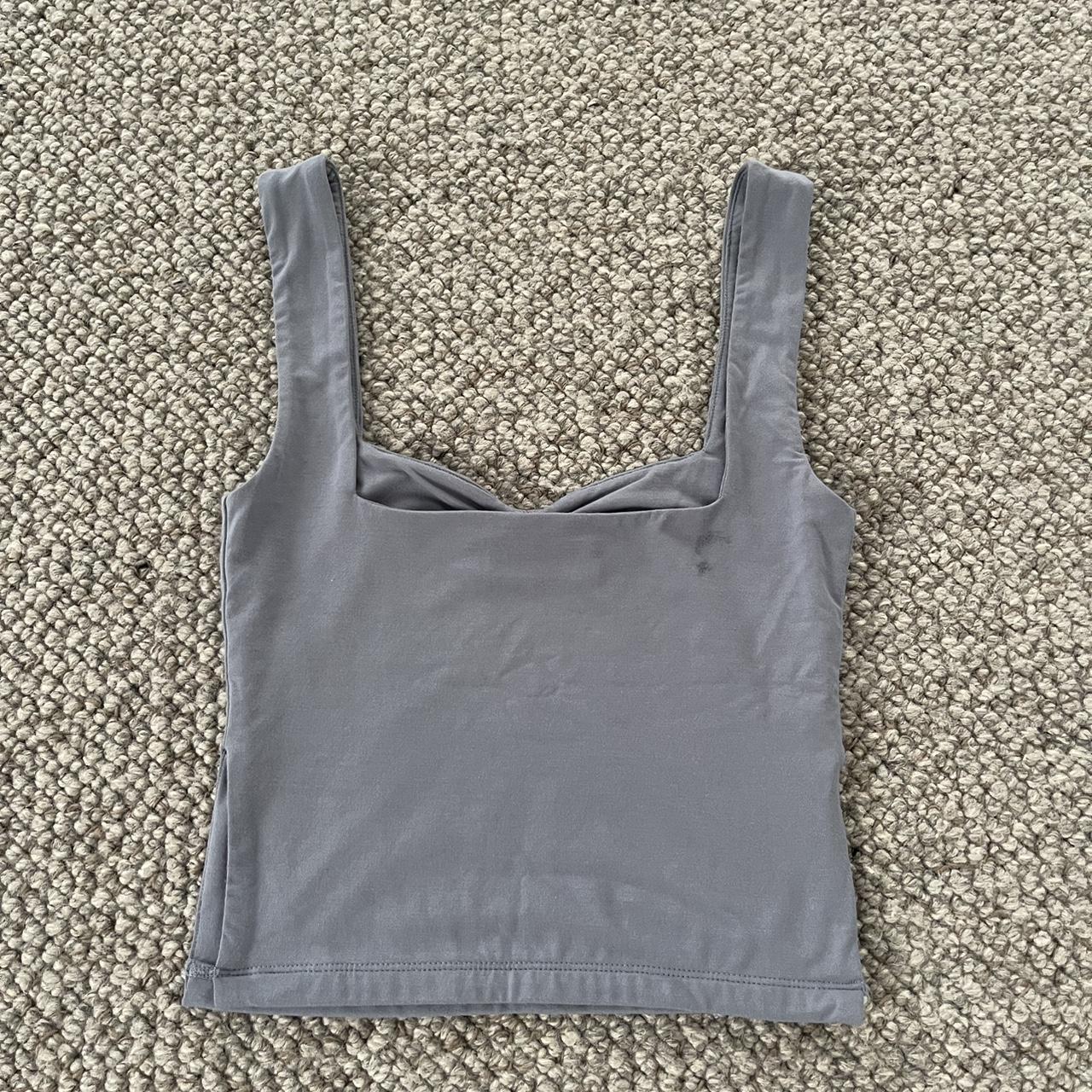 white fox top! size xs small stain on back - Depop
