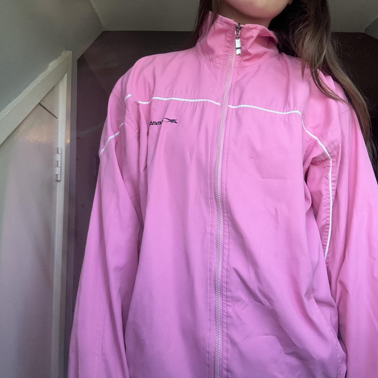 Pink reebok jacket, quite light so would be ideal... - Depop