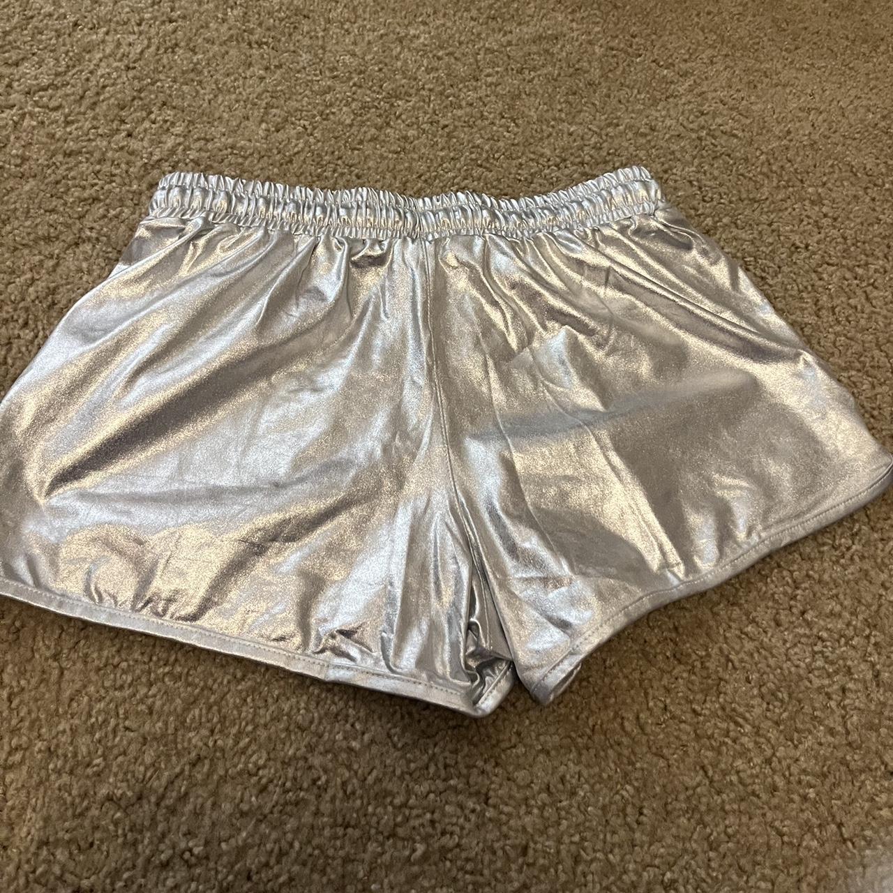 silver shiny booty shorts. never worn but they are... - Depop