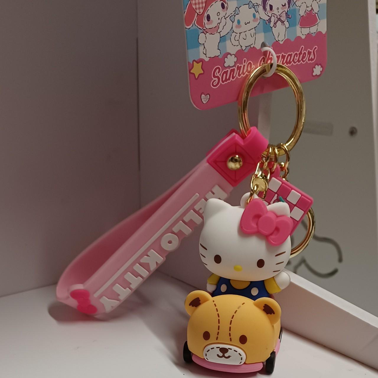 Sanrio Licensed Hello Kitty in a motorcar keychain -... - Depop