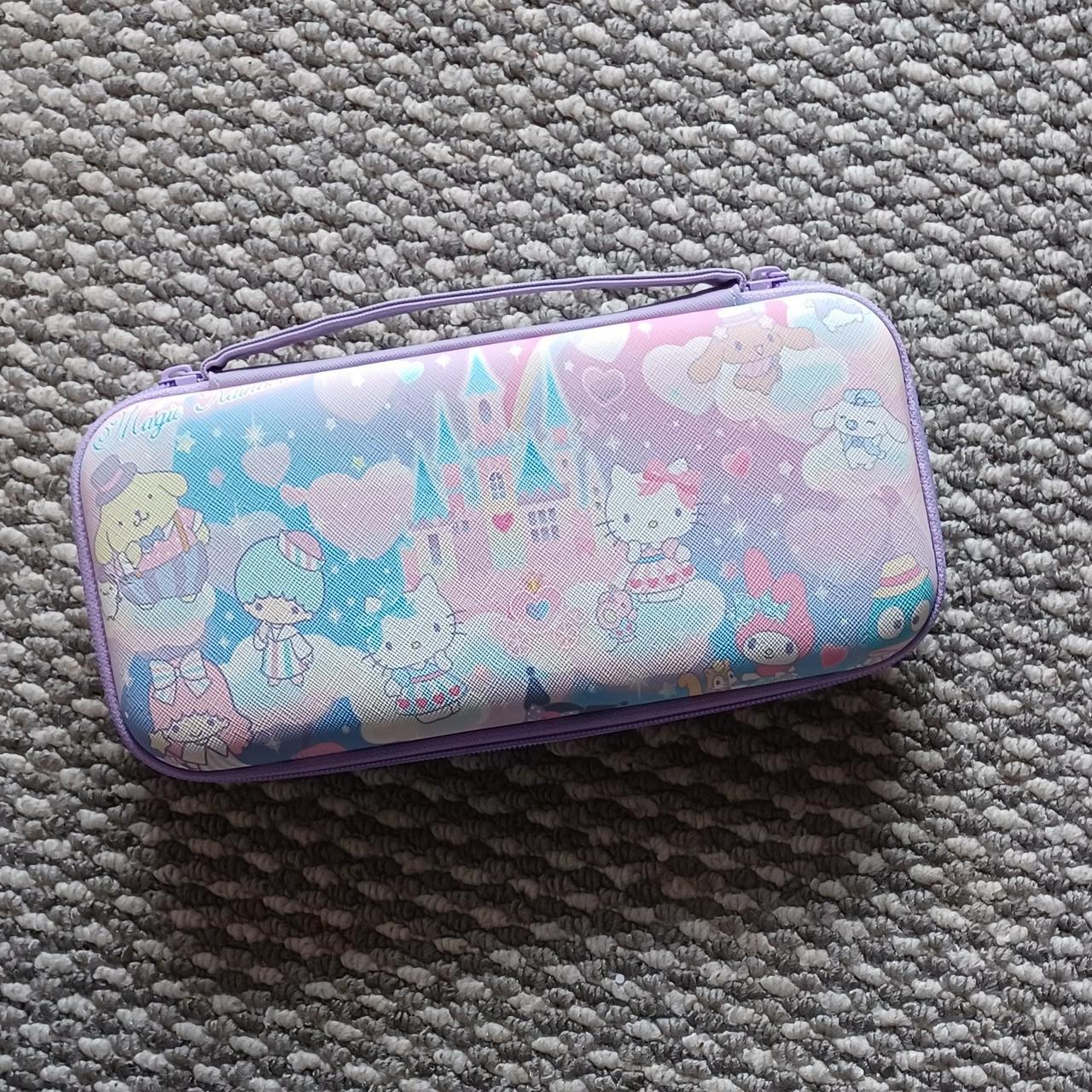 Sanrio family switch console case with game inserts.... - Depop