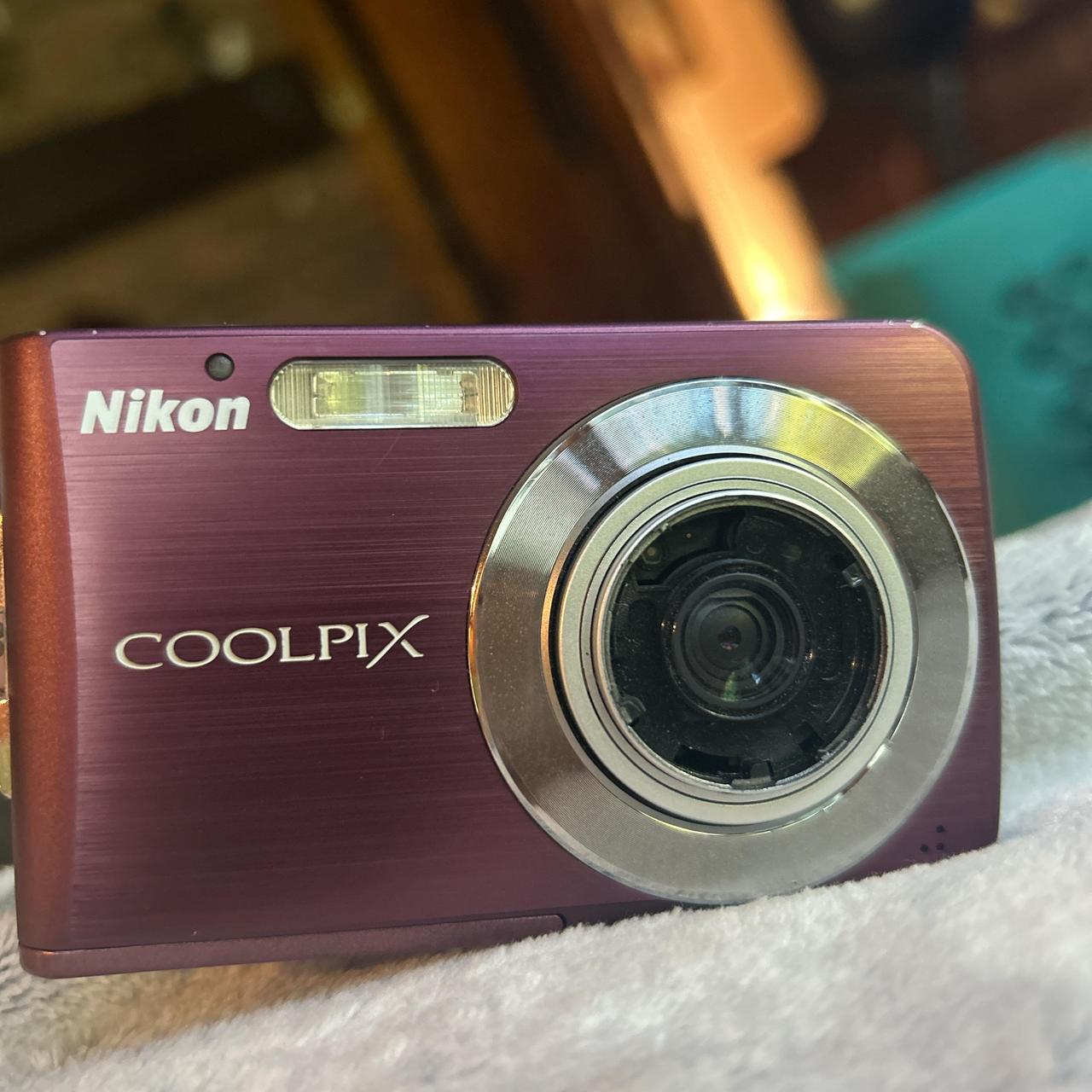 Nikon purple Coolpix camera not sure if it works,... - Depop