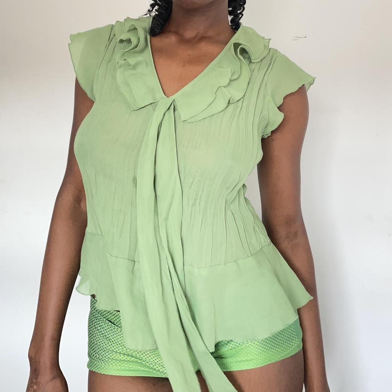 Beautiful vintage green ruffle top with a lovely... - Depop