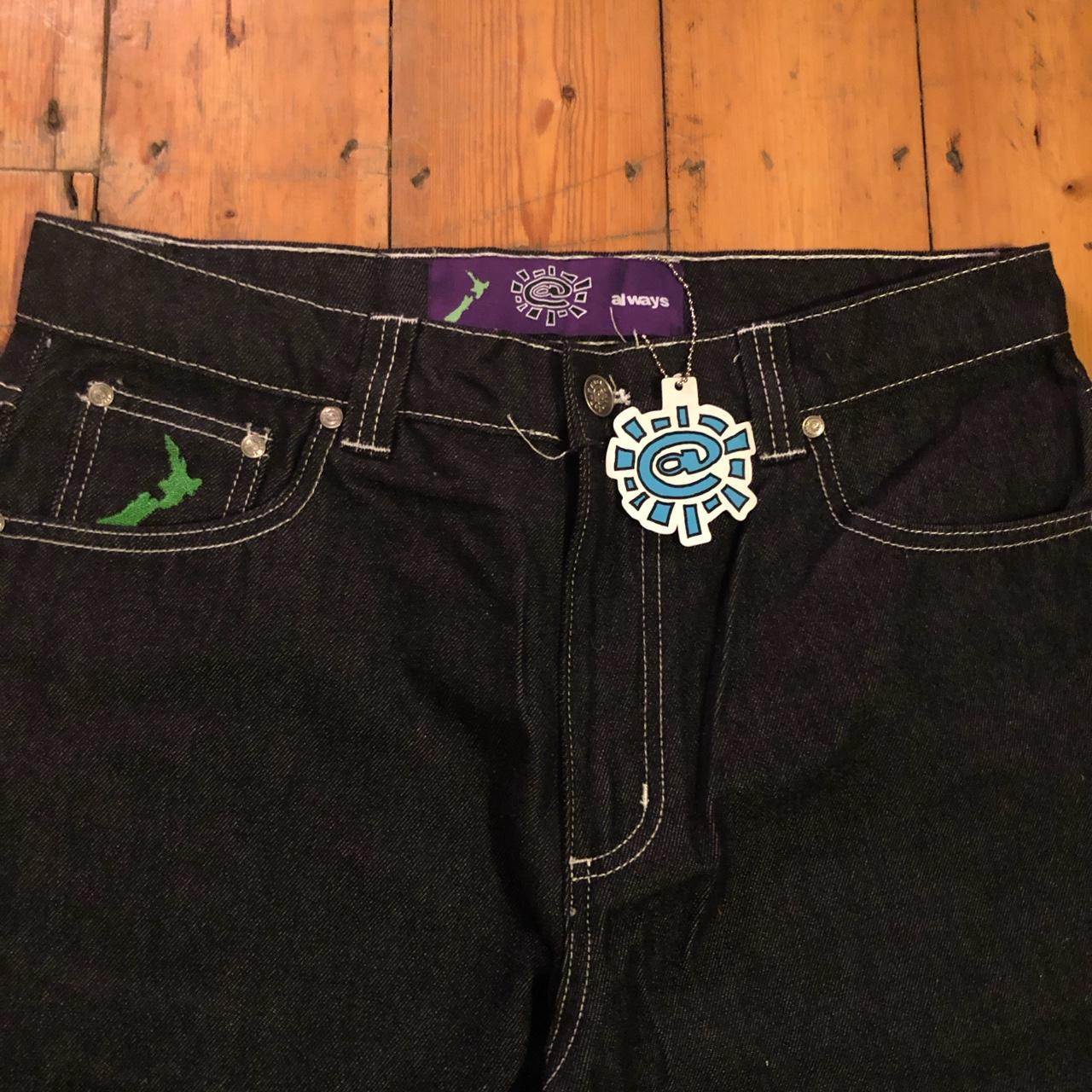 ADWYSD heavy duty black jeans with sticker... - Depop