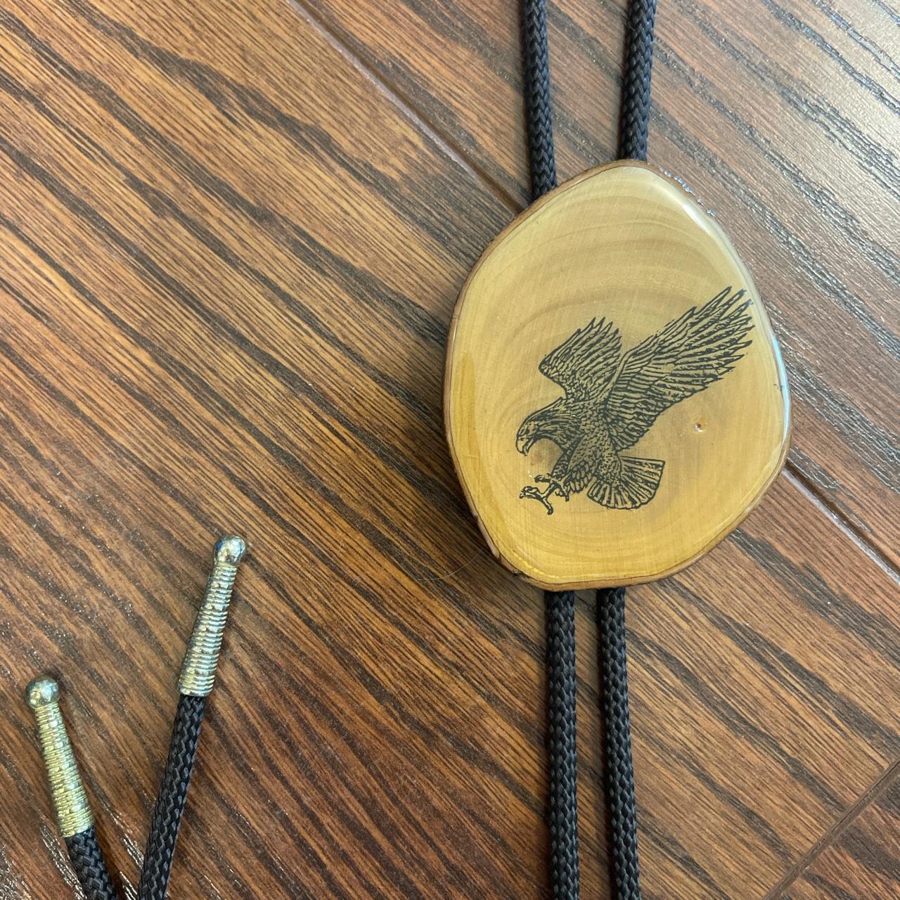 Vintage lacquered wood bolo tie with hawk detailing.... - Depop