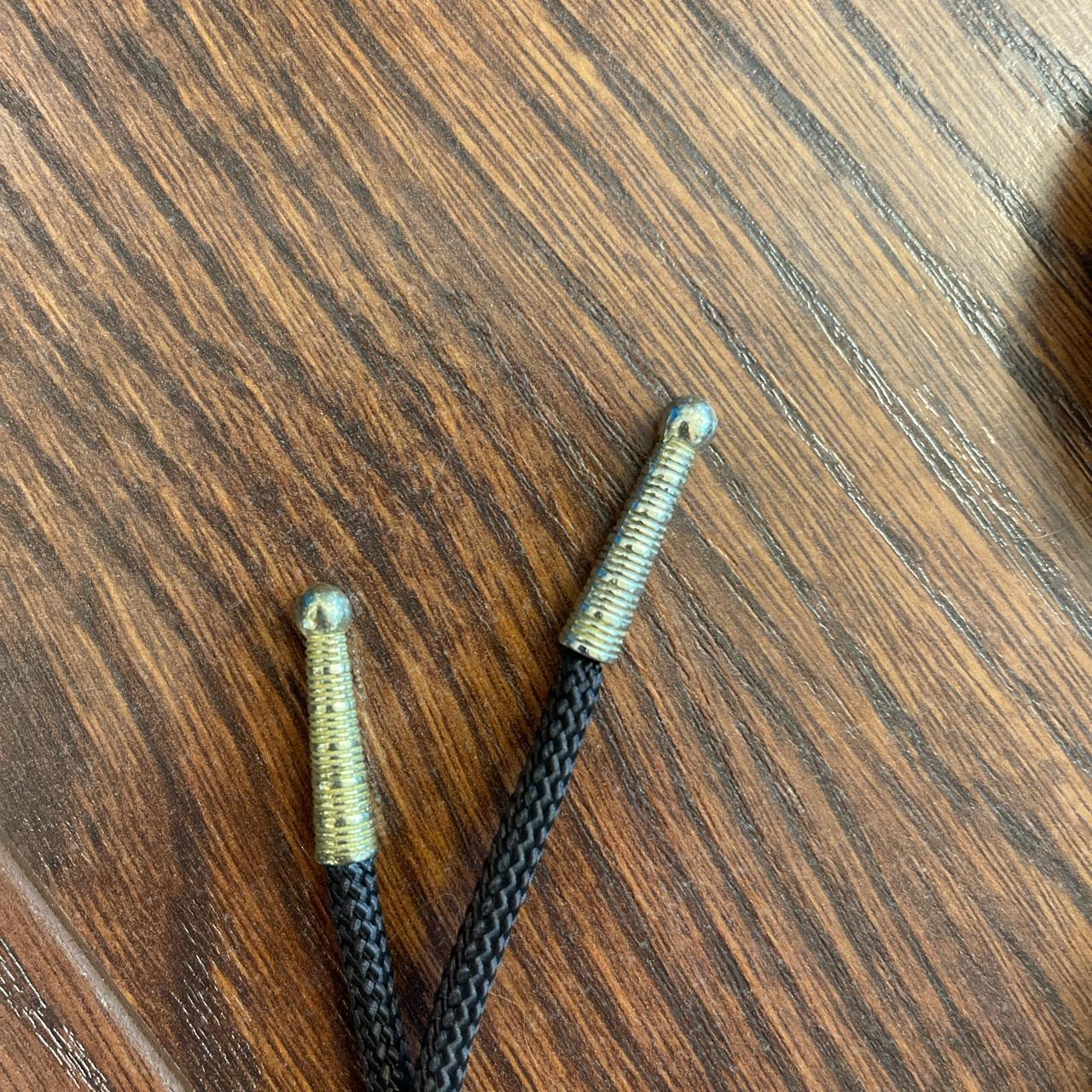 Vintage lacquered wood bolo tie with hawk detailing.... - Depop