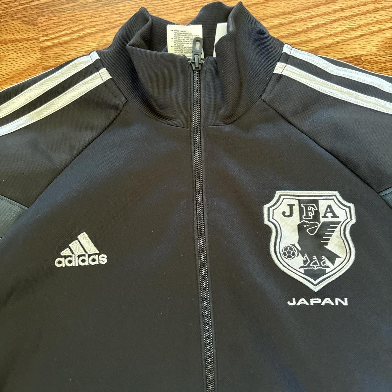 Adidas Japan soccer jacket with silver stripes used... - Depop