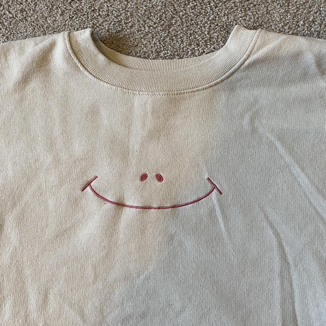 cream smiley face crewneck (only worn once’s) - Depop
