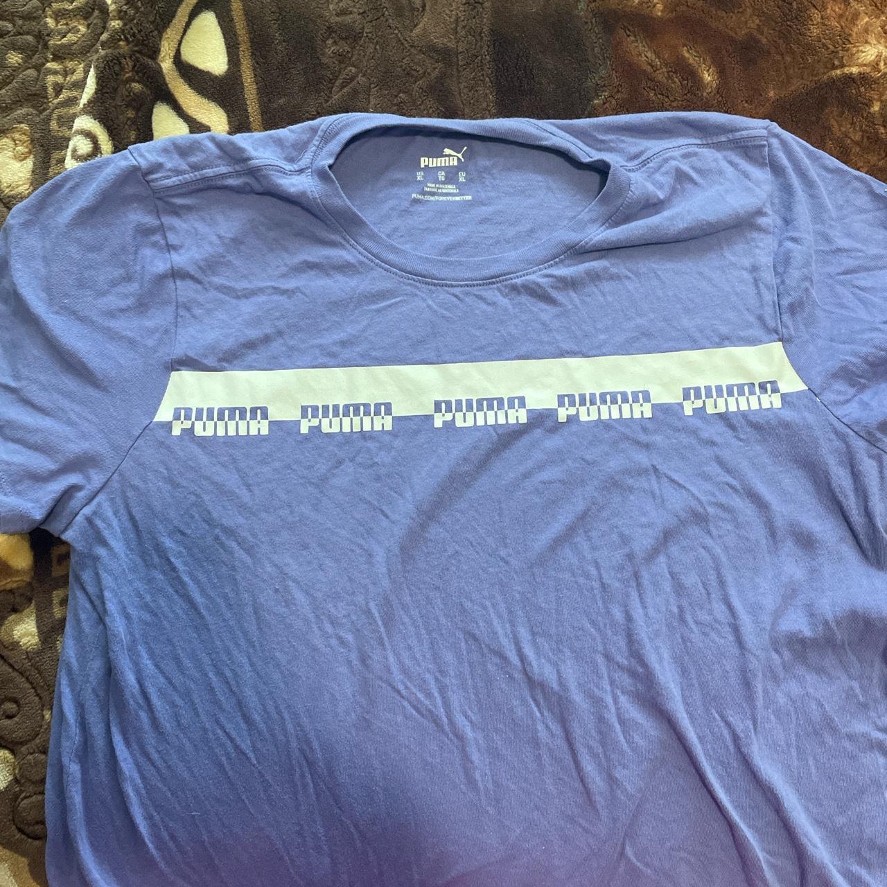 A purple Puma shirt - Depop