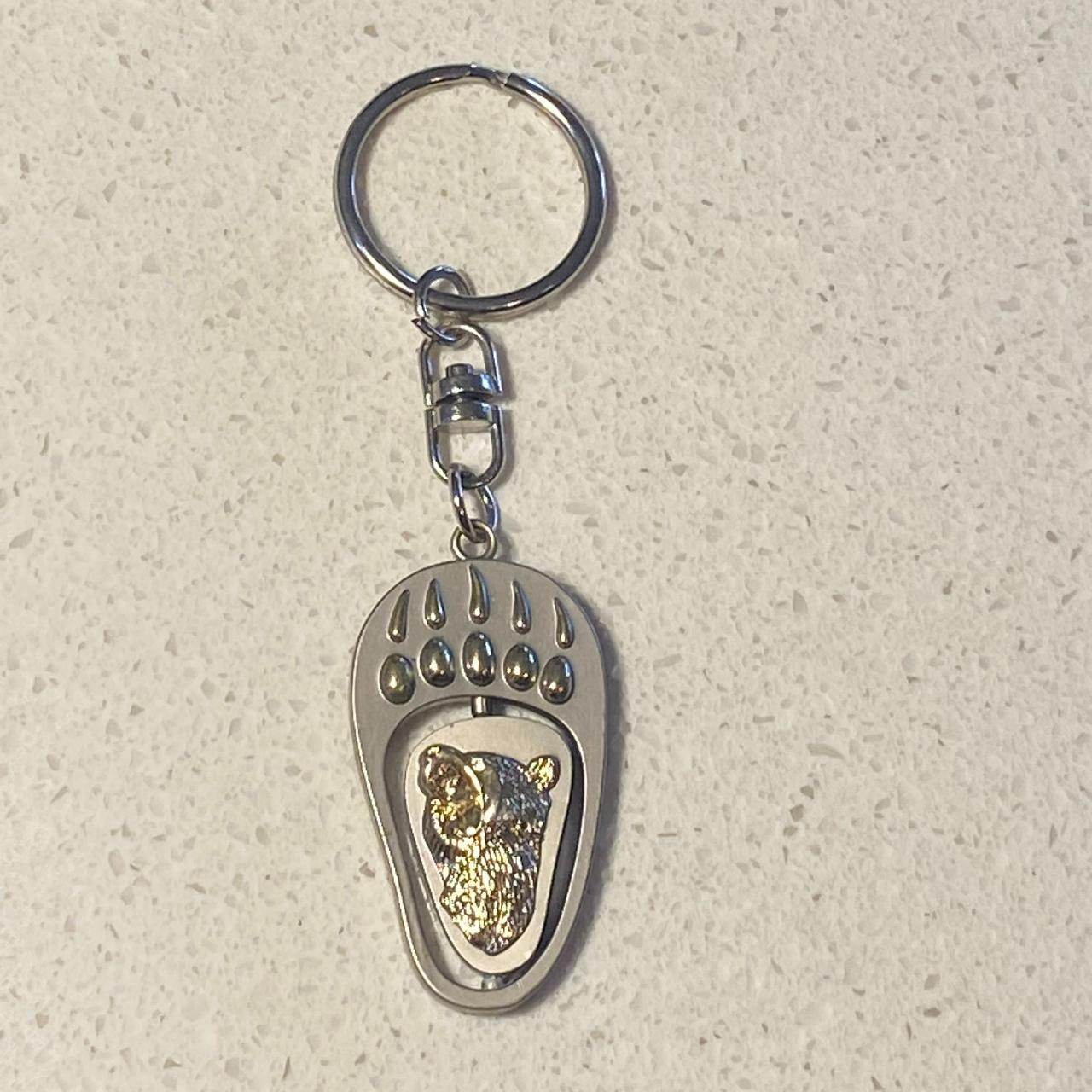 Alaska Silver Keychain with Bear Claw Spinning... - Depop