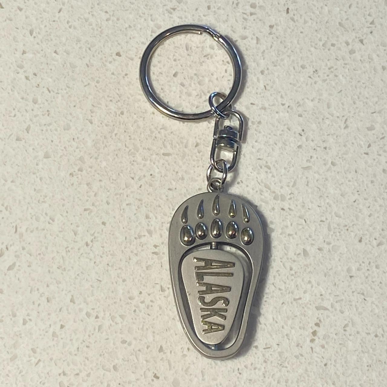 Alaska Silver Keychain with Bear Claw Spinning... - Depop