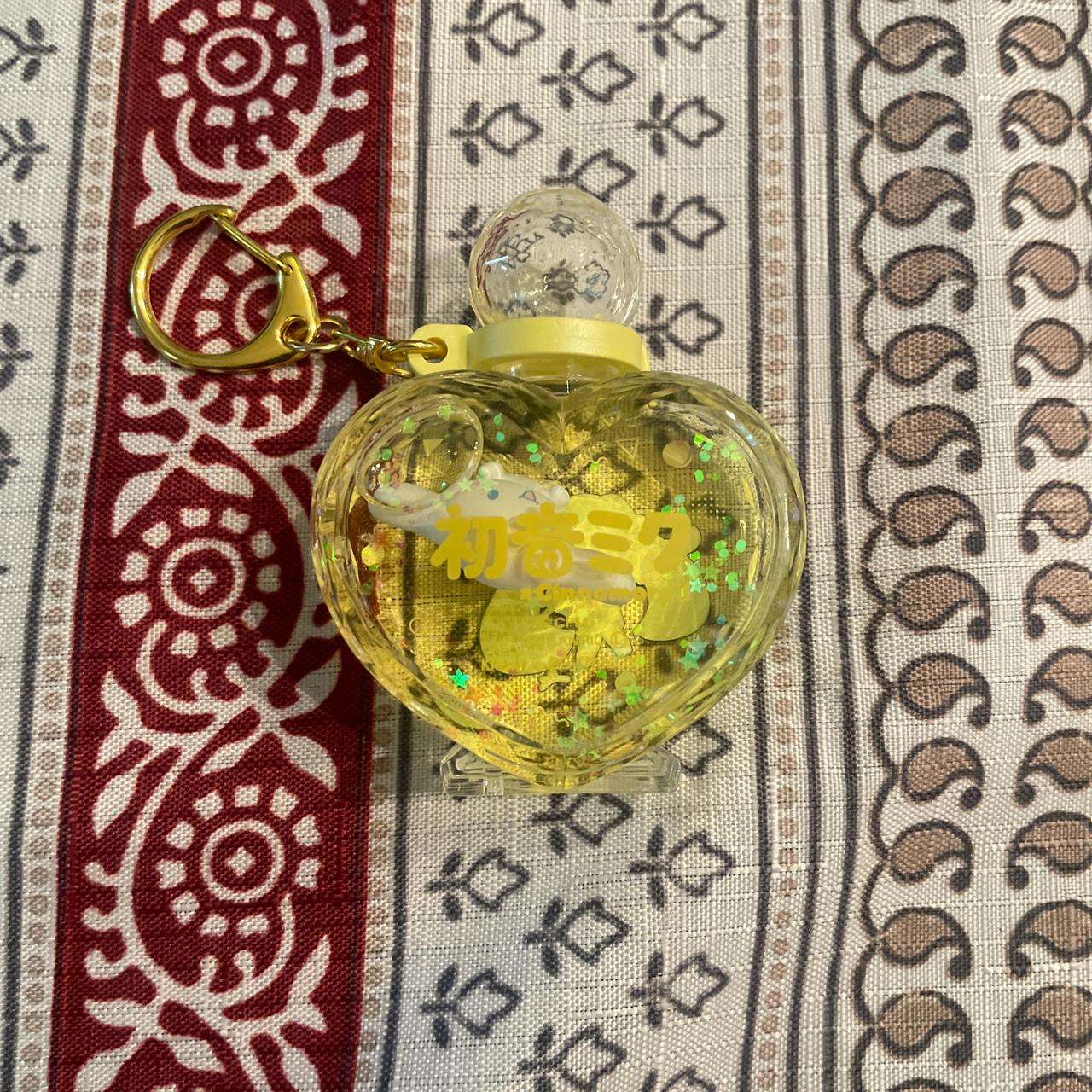 Yellow Hatsune Miku perfume bottle keychain... | Depop