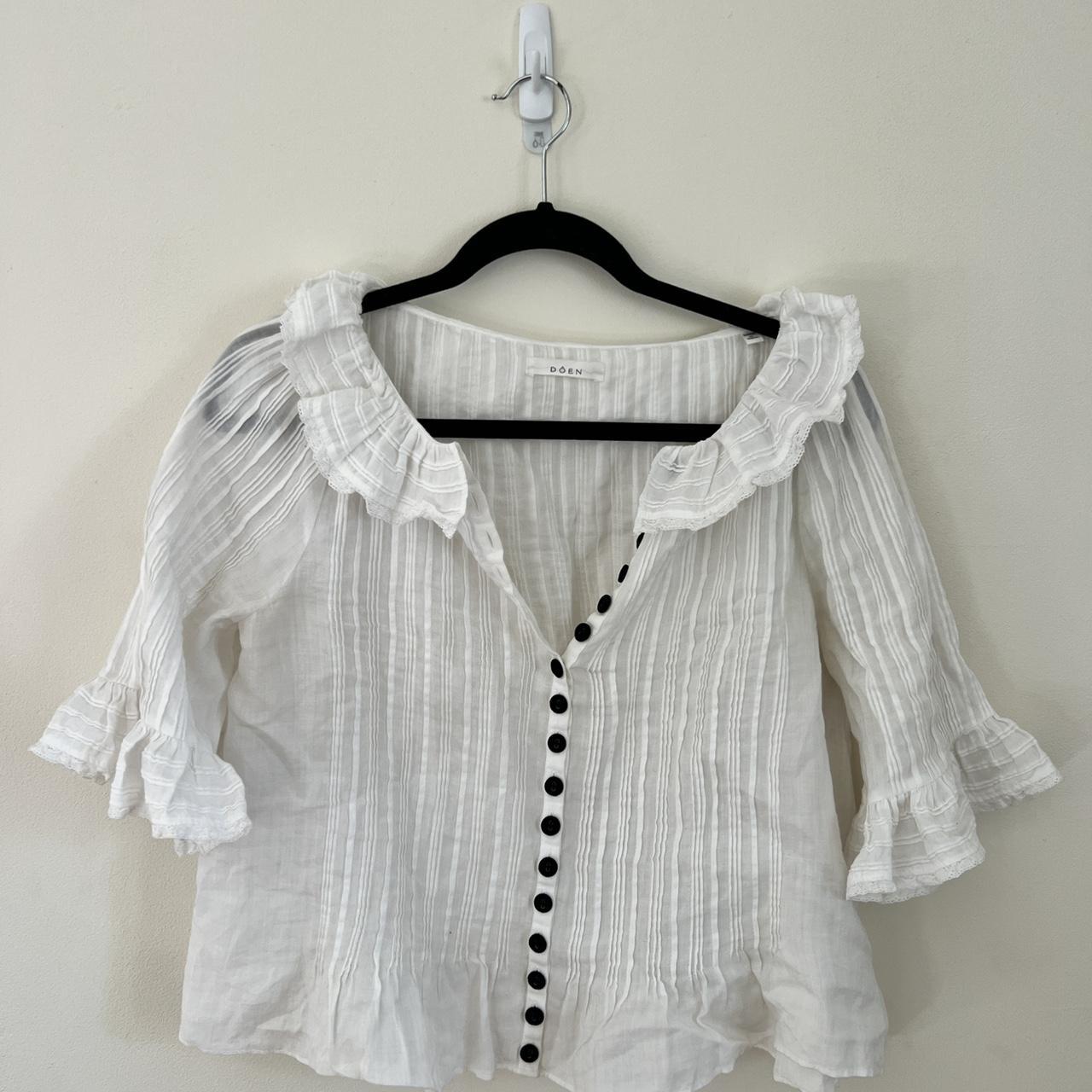 Doen top with black accent buttons Never Worn... - Depop
