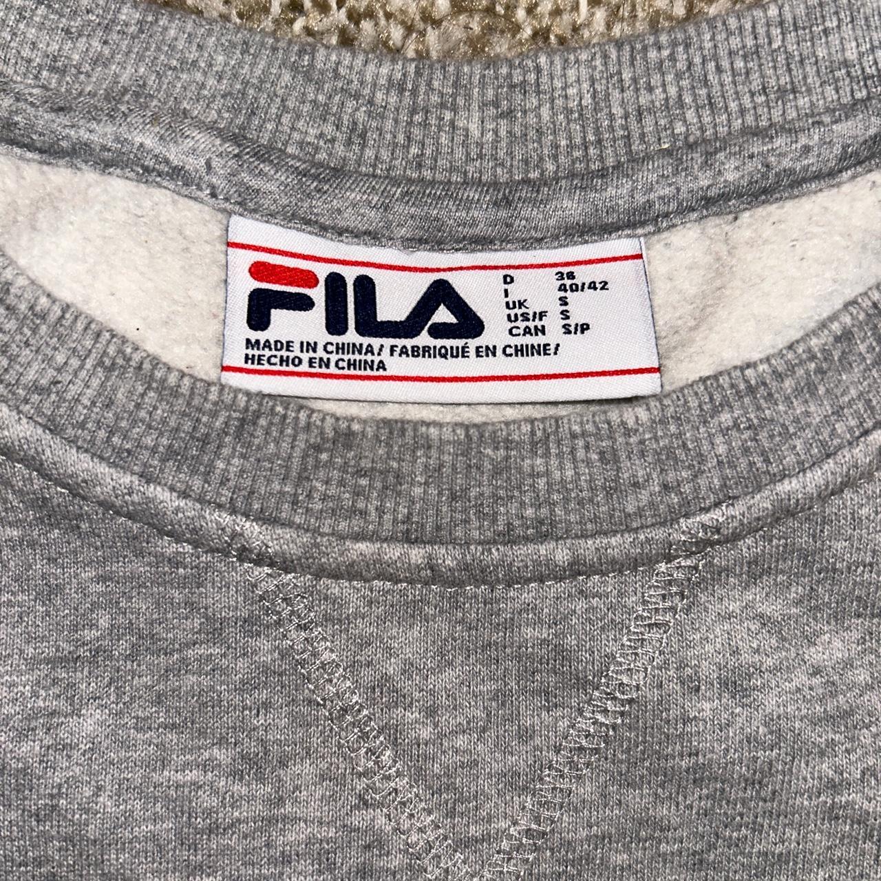 Grey Fila crew neck - Depop