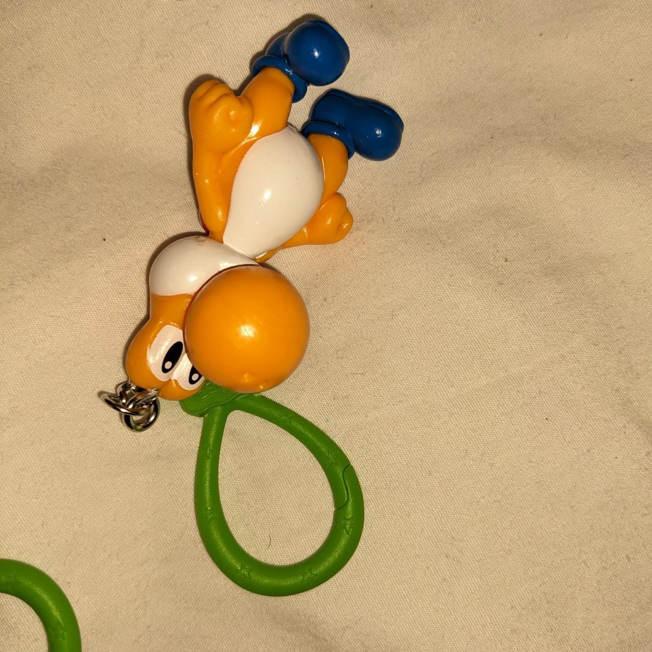 Orange yoshi mystery bag keychain super... - Depop