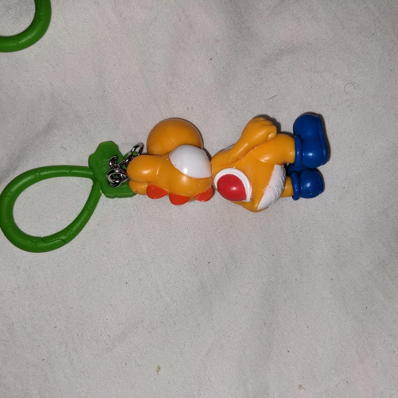 Orange yoshi mystery bag keychain super... - Depop
