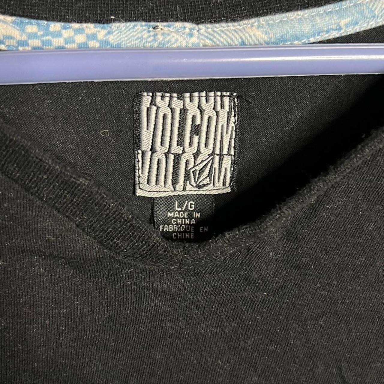 Volcom Black and purple Halferizer v-neck shirt. 55%... - Depop