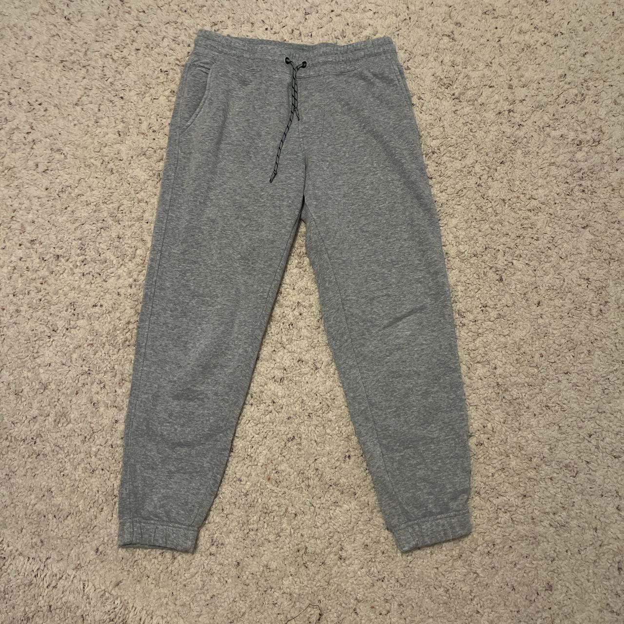 medium weatherproof lines sweatpants, worn but only... - Depop