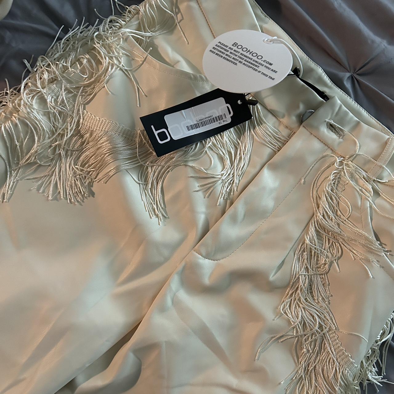 Brand new boohoo cream leather pants with fringe - Depop
