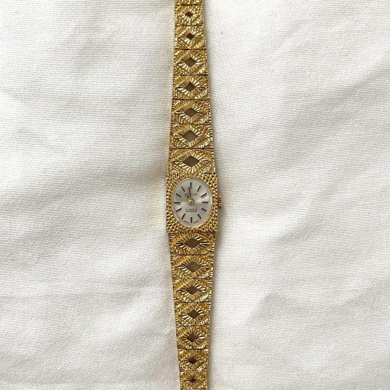 Non-working gold vintage with thicker... - Depop