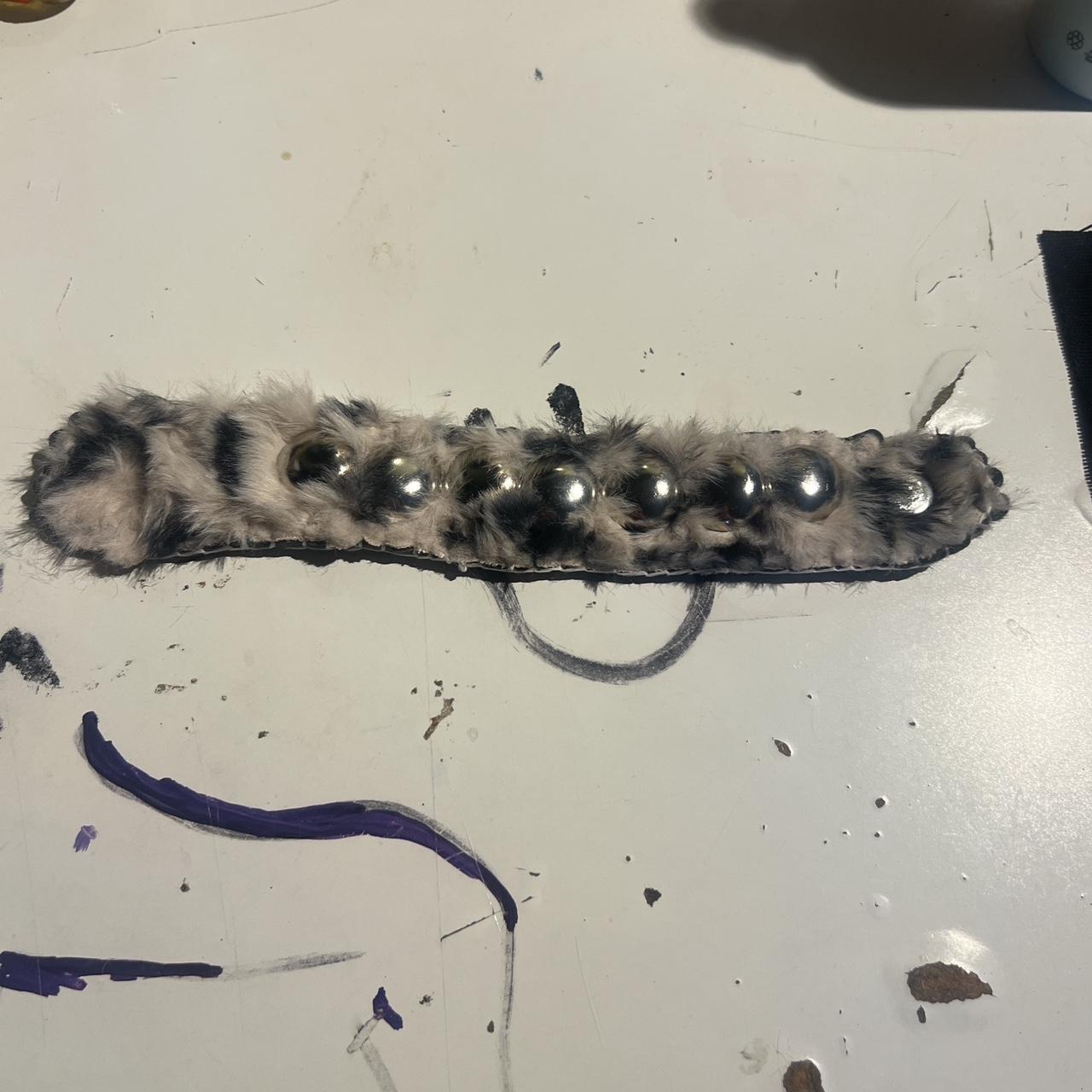 adjustable faux leather and fuzzy with some circle... | Depop