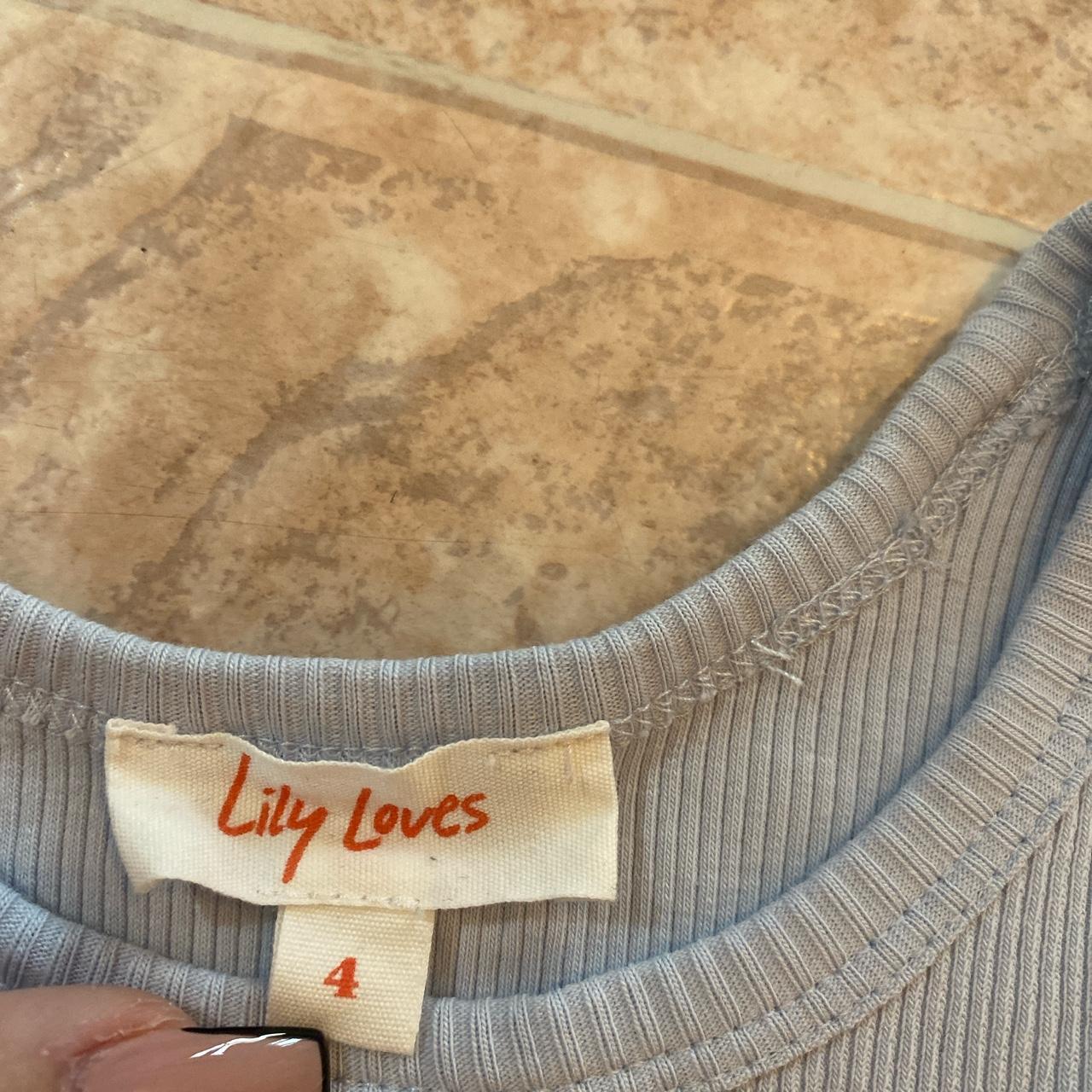 Light blue singlet top. Size 4 Brand is Lily Loves... - Depop