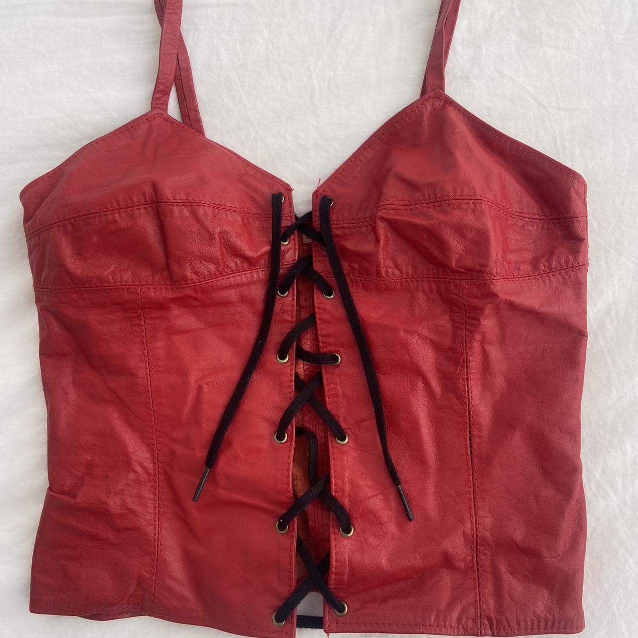 Red leather corset top with lace up front Size M... - Depop